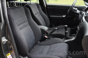 Grey Toyota Corolla 2004 in Riga, with an engine capacity of 1.40 L and mileage of 405 thousand km for 600 €, photo 11 on AUTOMOTO.COM.LV