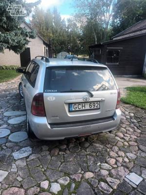 Pelēks Toyota Corolla 2004 Viļņa, ar dzinēja tilpumu 2.00 L un nobraukumu 198 tūkst. km par 2000 €, foto 5 vietnē AUTOMOTO.COM.LV