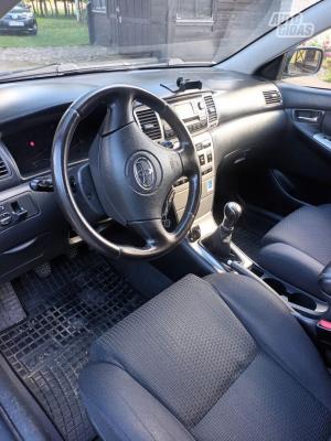 Pelēks Toyota Corolla 2004 Viļņa, ar dzinēja tilpumu 2.00 L un nobraukumu 198 tūkst. km par 2000 €, foto 9 vietnē AUTOMOTO.COM.LV