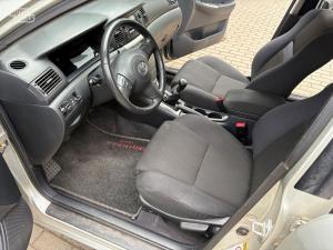 Grey Toyota Corolla 2005 in Vilnius, with an engine capacity of 1.40 L and mileage of 215 thousand km for 1499 €, photo 12 on AUTOMOTO.COM.LV