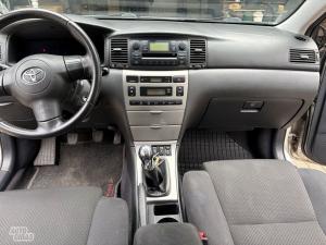 Grey Toyota Corolla 2005 in Vilnius, with an engine capacity of 1.40 L and mileage of 215 thousand km for 1499 €, photo 14 on AUTOMOTO.COM.LV