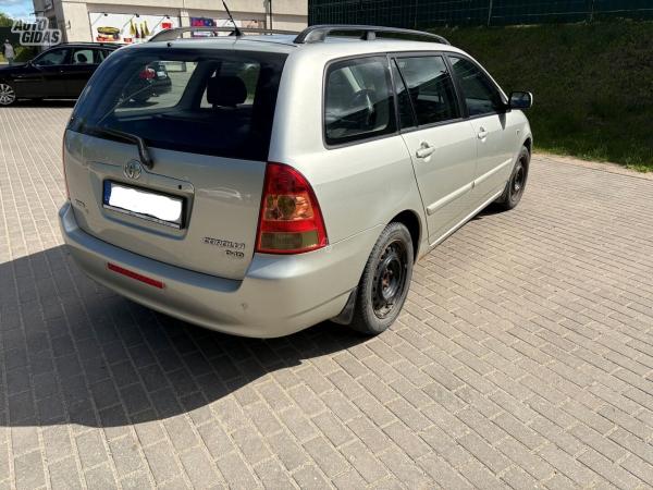 Grey Toyota Corolla 2005 in Vilnius, with an engine capacity of 1.40 L and mileage of 215 thousand km for 1499 €, photo 3 on AUTOMOTO.COM.LV