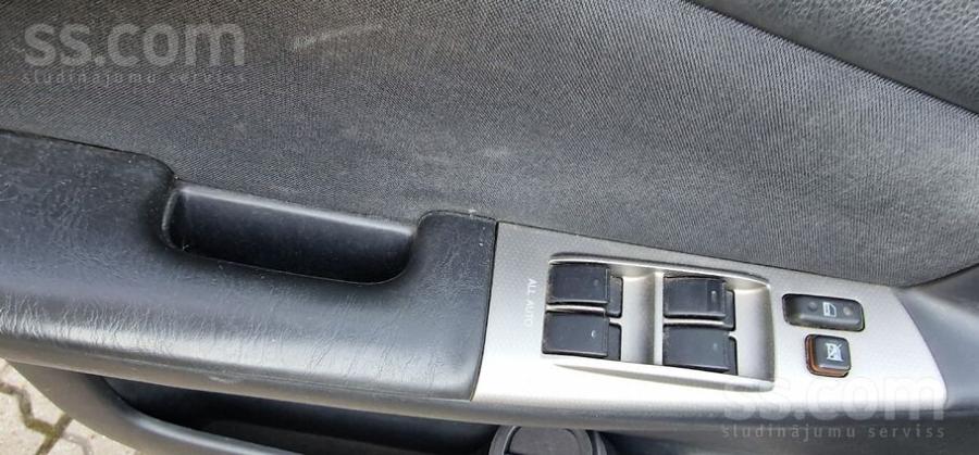 Grey Toyota Corolla 2006 in Riga, with an engine capacity of 1.40 L and mileage of 380 thousand km for 1600 €, photo 12 on AUTOMOTO.COM.LV