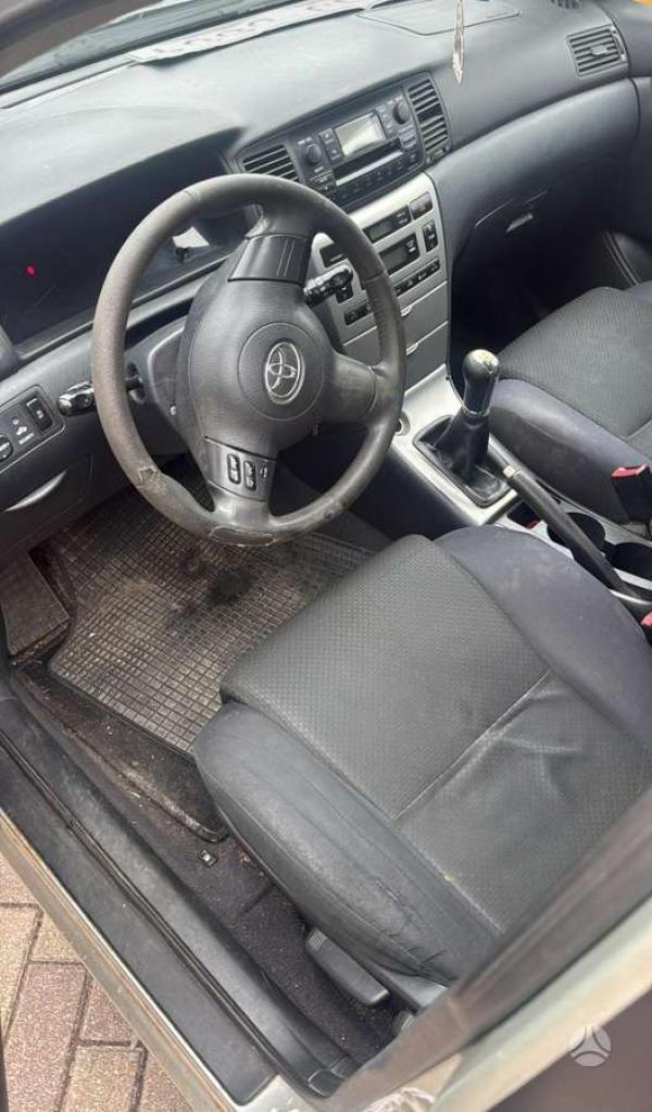Pelēks Toyota Corolla 2006 Kauņa, ar dzinēja tilpumu 1.36 L un nobraukumu 280 tūkst. km par 1150 €, foto 5 vietnē AUTOMOTO.COM.LV