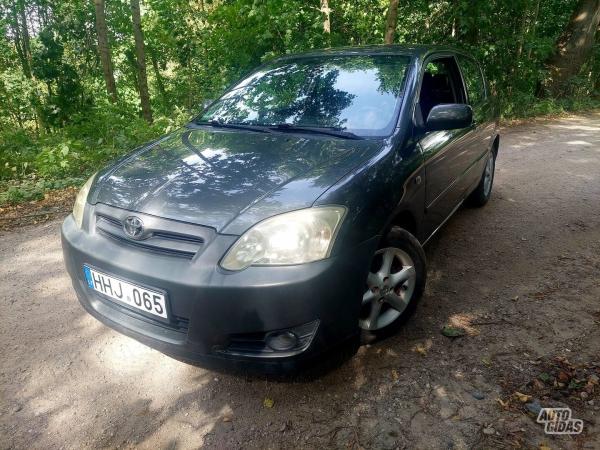 Pelēks Toyota Corolla 2006 Elektrėnai, ar dzinēja tilpumu 2.00 L un nobraukumu 270 tūkst. km par 750 €, foto 1 vietnē AUTOMOTO.COM.LV