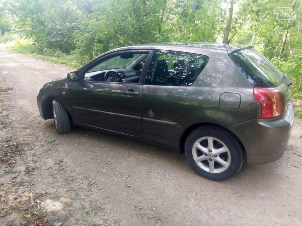 Pelēks Toyota Corolla 2006 Elektrėnai, ar dzinēja tilpumu 2.00 L un nobraukumu 270 tūkst. km par 750 €, foto 4 vietnē AUTOMOTO.COM.LV