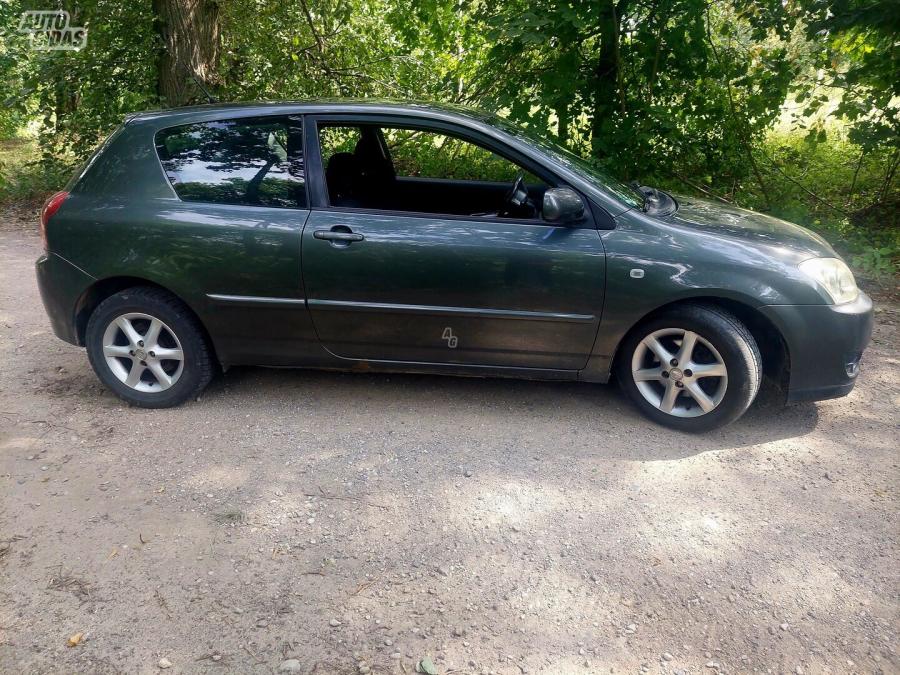 Pelēks Toyota Corolla 2006 Elektrėnai, ar dzinēja tilpumu 2.00 L un nobraukumu 270 tūkst. km par 750 €, foto 7 vietnē AUTOMOTO.COM.LV
