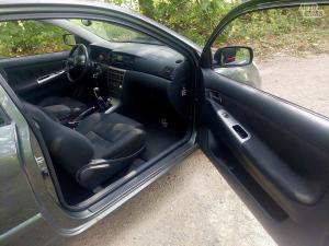 Pelēks Toyota Corolla 2006 Elektrėnai, ar dzinēja tilpumu 2.00 L un nobraukumu 270 tūkst. km par 750 €, foto 8 vietnē AUTOMOTO.COM.LV