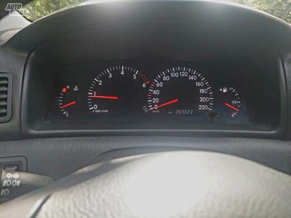 Pelēks Toyota Corolla 2006 Elektrėnai, ar dzinēja tilpumu 2.00 L un nobraukumu 270 tūkst. km par 750 €, foto 10 vietnē AUTOMOTO.COM.LV