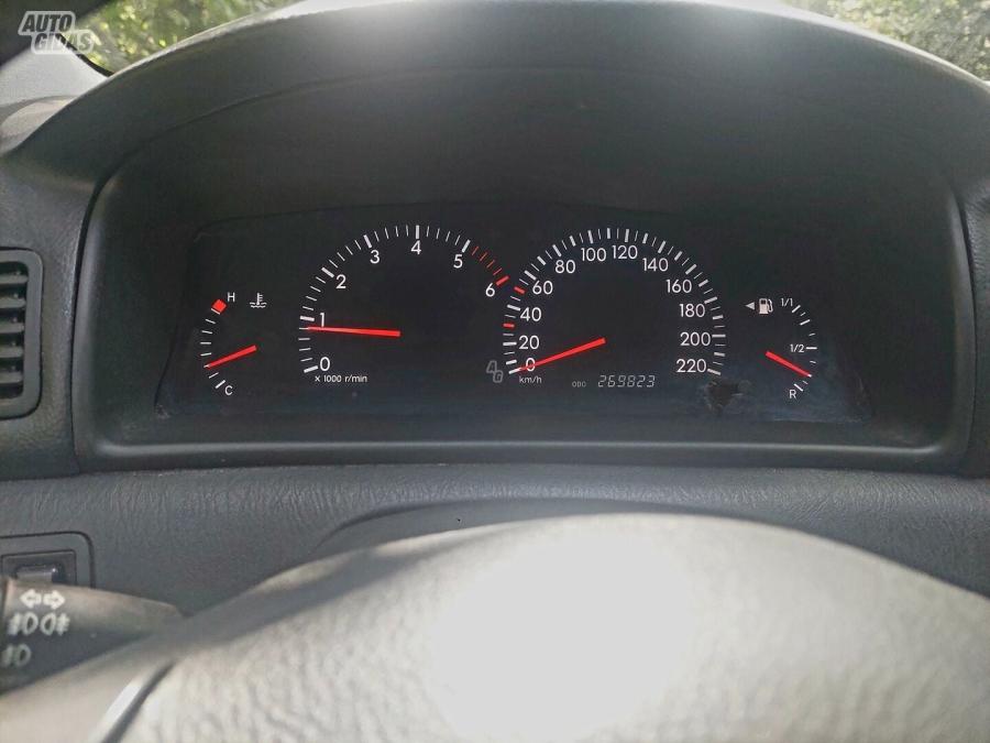 Pelēks Toyota Corolla 2006 Elektrėnai, ar dzinēja tilpumu 2.00 L un nobraukumu 270 tūkst. km par 750 €, foto 10 vietnē AUTOMOTO.COM.LV