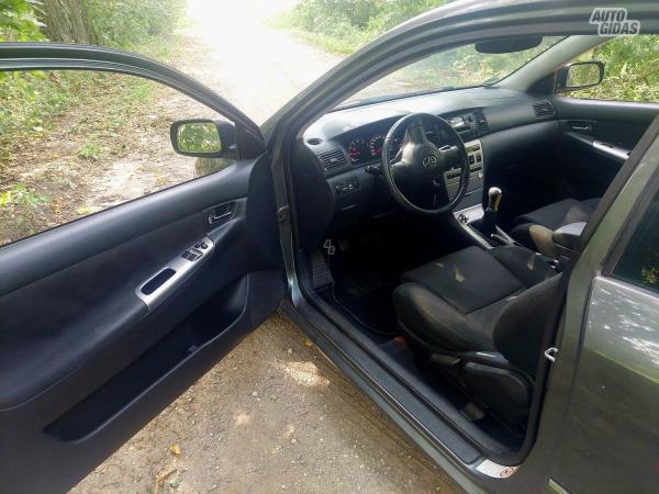 Pelēks Toyota Corolla 2006 Elektrėnai, ar dzinēja tilpumu 2.00 L un nobraukumu 270 tūkst. km par 750 €, foto 11 vietnē AUTOMOTO.COM.LV