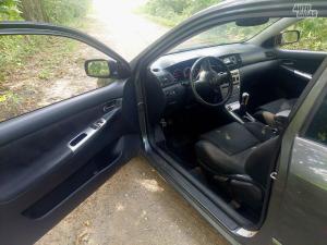 Pelēks Toyota Corolla 2006 Elektrėnai, ar dzinēja tilpumu 2.00 L un nobraukumu 270 tūkst. km par 750 €, foto 11 vietnē AUTOMOTO.COM.LV