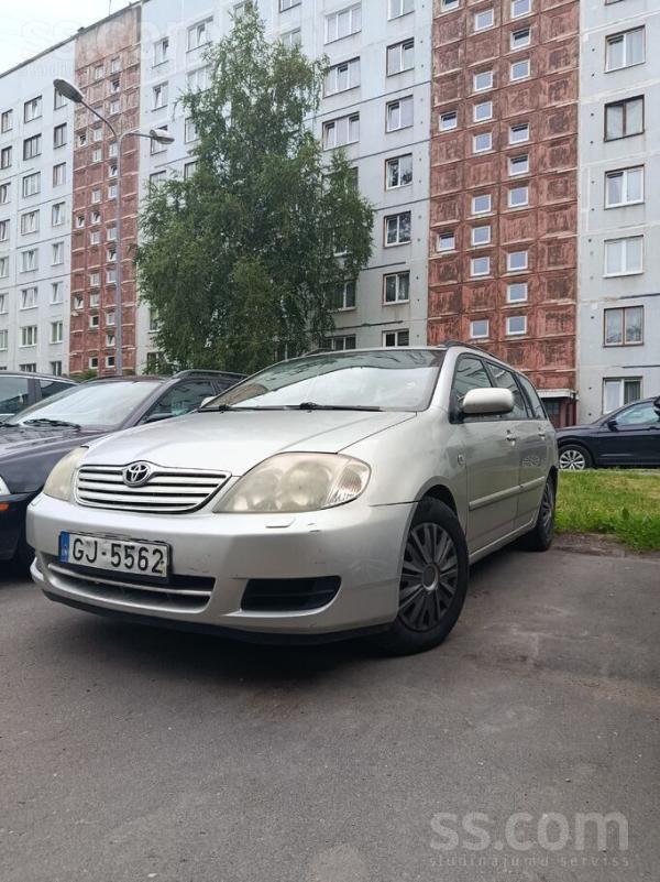 Grey Toyota Corolla 2007 in Riga, with an engine capacity of 2.00 L and mileage of 418 thousand km for 1000 €, photo 1 on AUTOMOTO.COM.LV