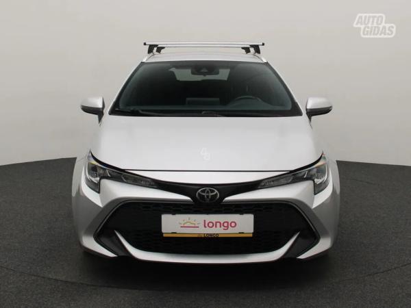 Grey Toyota Corolla 2021 in Vilnius, with an engine capacity of 1.20 L and mileage of 189 thousand km for 12199 €, photo 3 on AUTOMOTO.COM.LV