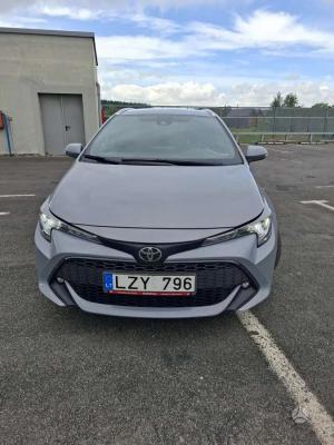 Grey Toyota Corolla 2021 in Vilnius, with an engine capacity of 1.20 L and mileage of 125 thousand km for 14900 €, photo  on AUTOMOTO.COM.LV