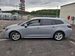 Grey Toyota Corolla 2021 in Vilnius, with an engine capacity of 1.20 L and mileage of 125 thousand km for 14900 €, photo 5 on AUTOMOTO.COM.LV