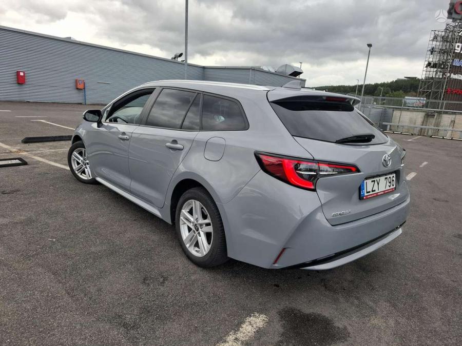 Grey Toyota Corolla 2021 in Vilnius, with an engine capacity of 1.20 L and mileage of 125 thousand km for 14900 €, photo 6 on AUTOMOTO.COM.LV