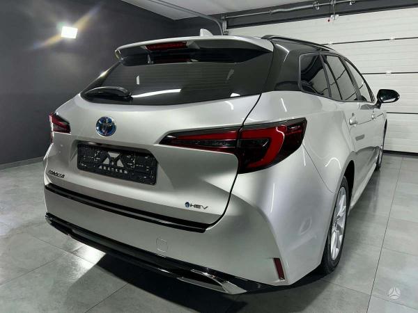 Grey Toyota Corolla 2024 in Utena, with an engine capacity of 1.80 L and mileage of 64 thousand km for 20350 €, photo 4 on AUTOMOTO.COM.LV
