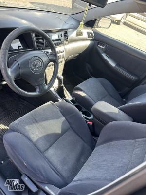 Toyota Corolla 2003 in Klaipeda, with an engine capacity of 2.00 L and mileage of 250 thousand km for 999 €, photo 8 on AUTOMOTO.COM.LV