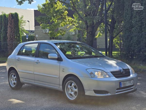 Toyota Corolla 2003 in Vilnius, with an engine capacity of 2.00 L and mileage of 219 thousand km for 1150 €, photo 1 on AUTOMOTO.COM.LV