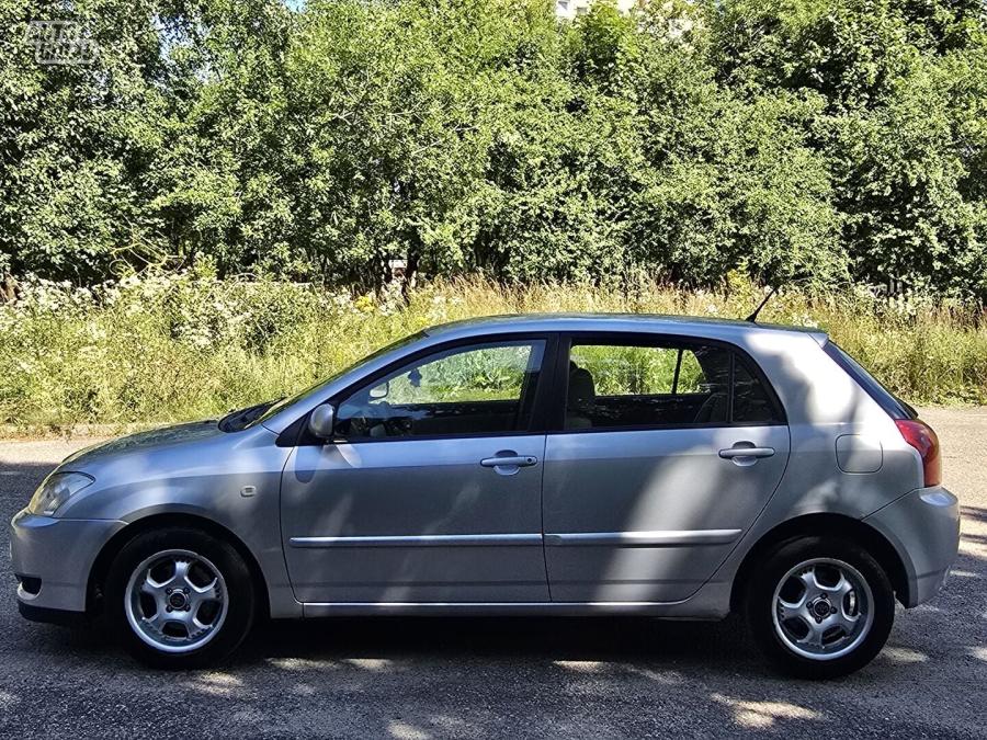 Toyota Corolla 2003 in Vilnius, with an engine capacity of 2.00 L and mileage of 219 thousand km for 1350 €, photo 4 on AUTOMOTO.COM.LV