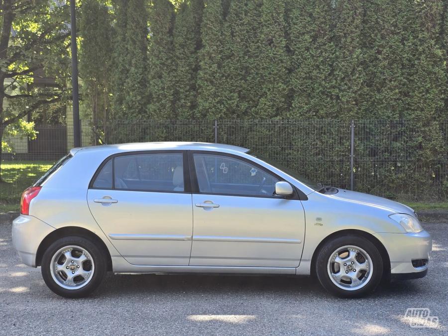 Toyota Corolla 2003 in Vilnius, with an engine capacity of 2.00 L and mileage of 219 thousand km for 1350 €, photo 5 on AUTOMOTO.COM.LV