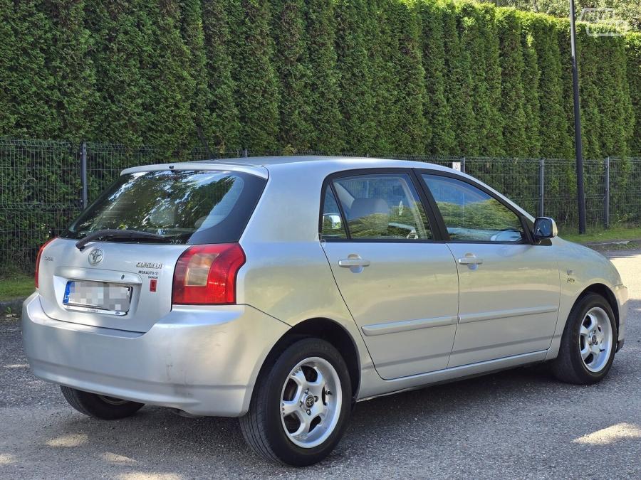 Toyota Corolla 2003 in Vilnius, with an engine capacity of 2.00 L and mileage of 219 thousand km for 1350 €, photo 6 on AUTOMOTO.COM.LV