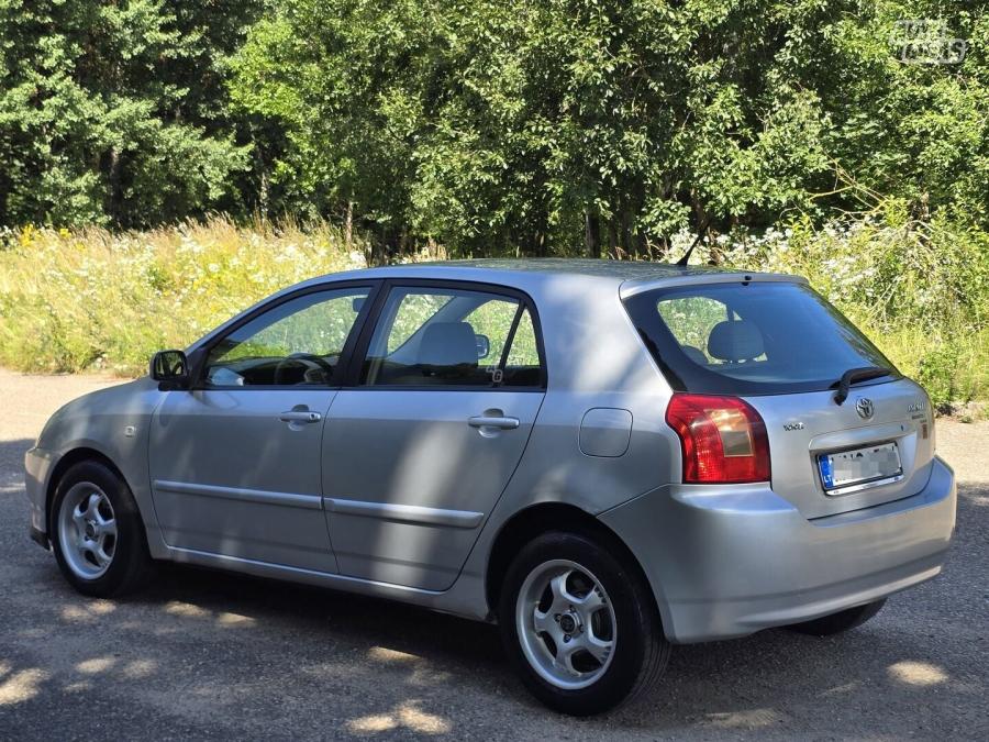 Toyota Corolla 2003 in Vilnius, with an engine capacity of 2.00 L and mileage of 219 thousand km for 1350 €, photo 7 on AUTOMOTO.COM.LV