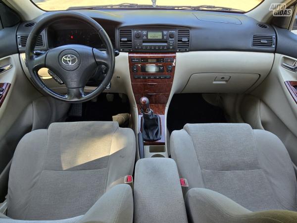 Toyota Corolla 2003 in Vilnius, with an engine capacity of 2.00 L and mileage of 219 thousand km for 1150 €, photo 10 on AUTOMOTO.COM.LV