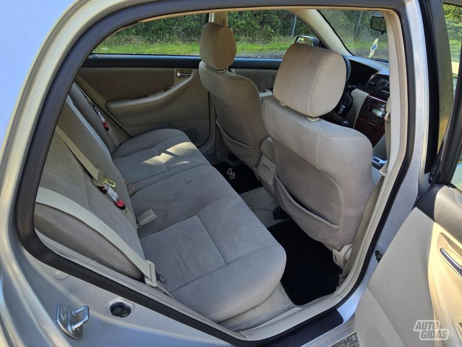 Toyota Corolla 2003 in Vilnius, with an engine capacity of 2.00 L and mileage of 219 thousand km for 1350 €, photo 13 on AUTOMOTO.COM.LV
