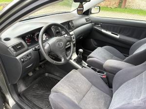 Toyota Corolla 2003 in Vilnius, with an engine capacity of 2.00 L and mileage of 324 thousand km for 1150 €, photo 12 on AUTOMOTO.COM.LV