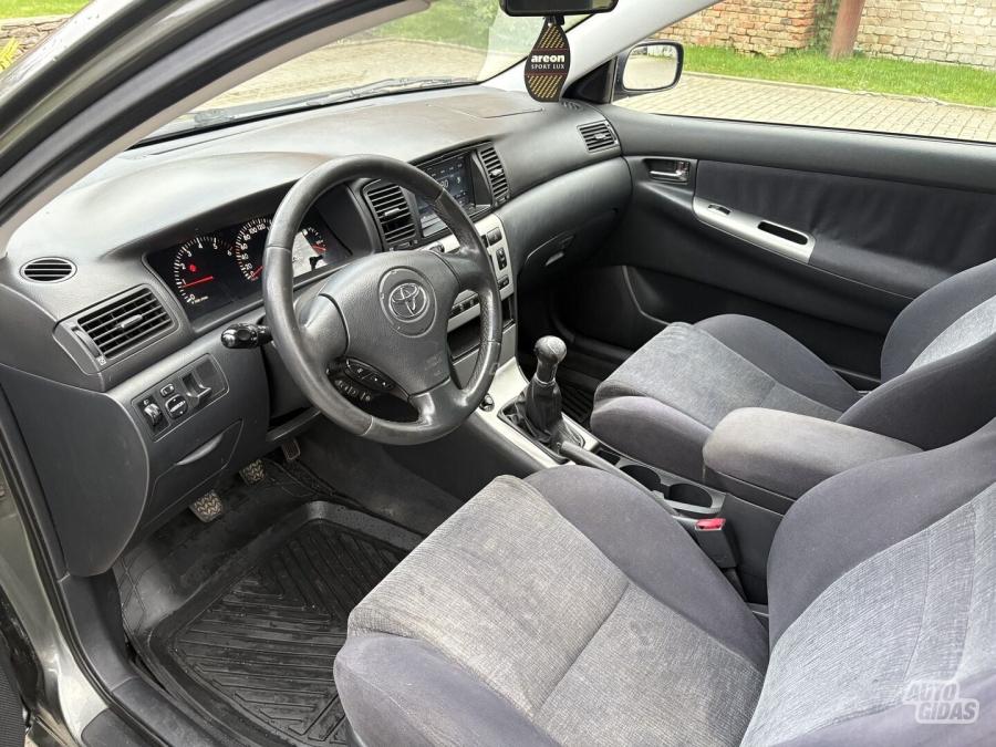 Toyota Corolla 2003 in Vilnius, with an engine capacity of 2.00 L and mileage of 324 thousand km for 1150 €, photo 12 on AUTOMOTO.COM.LV