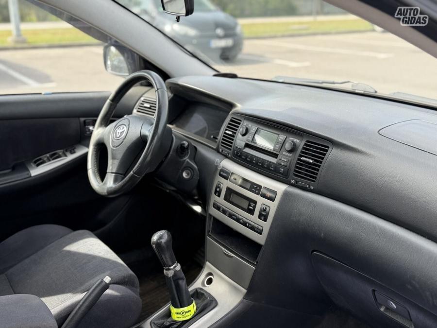 Toyota Corolla 2004 in Kaunas, with an engine capacity of 2.00 L and mileage of 332 thousand km for 350 €, photo 6 on AUTOMOTO.COM.LV