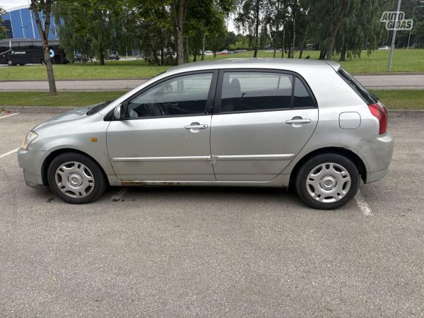 Toyota Corolla 2006 Viļņa, ar dzinēja tilpumu 1.40 L un nobraukumu 241 tūkst. km par 950 €, foto 4 vietnē AUTOMOTO.COM.LV