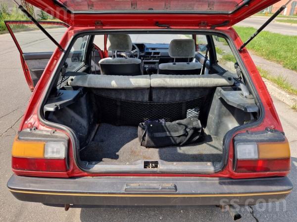 Red Toyota Corolla 1986 in Riga, with an engine capacity of 1.60 L and mileage of 219 thousand km for 4600 €, photo 9 on AUTOMOTO.COM.LV