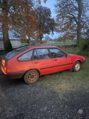 Red Toyota Corolla 1987 in Panevezys, with an engine capacity of 1.60 L and mileage of 169 thousand km for 450 €, photo 6 on AUTOMOTO.COM.LV