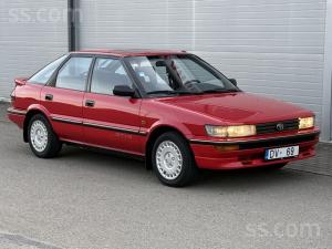 Red Toyota Corolla 1991 in Riga, with an engine capacity of 1.60 L and mileage of 180 thousand km for 13990 €, photo  on AUTOMOTO.COM.LV