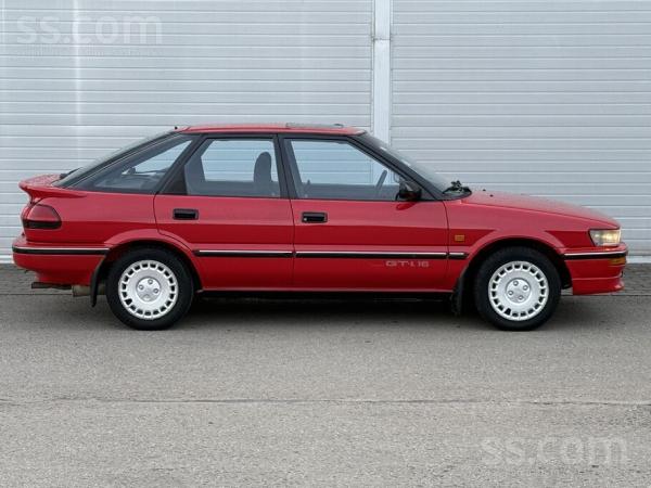 Red Toyota Corolla 1991 in Riga, with an engine capacity of 1.60 L and mileage of 180 thousand km for 9990 €, photo 4 on AUTOMOTO.COM.LV