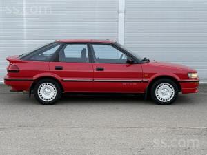 Red Toyota Corolla 1991 in Riga, with an engine capacity of 1.60 L and mileage of 180 thousand km for 9990 €, photo 4 on AUTOMOTO.COM.LV