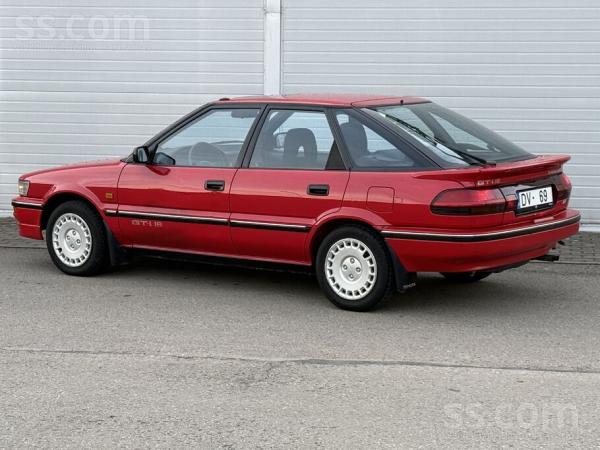 Red Toyota Corolla 1991 in Riga, with an engine capacity of 1.60 L and mileage of 180 thousand km for 9990 €, photo 7 on AUTOMOTO.COM.LV