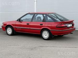 Red Toyota Corolla 1991 in Riga, with an engine capacity of 1.60 L and mileage of 180 thousand km for 9990 €, photo 7 on AUTOMOTO.COM.LV