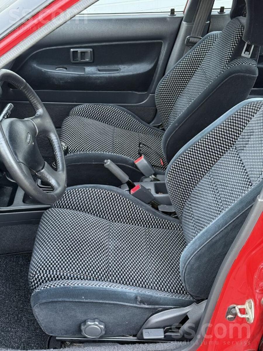 Red Toyota Corolla 1991 in Riga, with an engine capacity of 1.60 L and mileage of 180 thousand km for 9990 €, photo 13 on AUTOMOTO.COM.LV