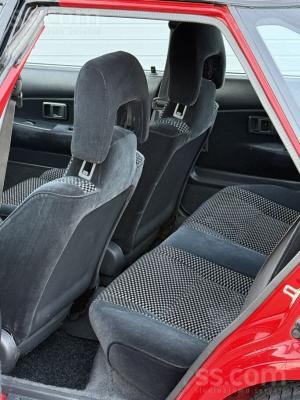 Red Toyota Corolla 1991 in Riga, with an engine capacity of 1.60 L and mileage of 180 thousand km for 9990 €, photo 14 on AUTOMOTO.COM.LV