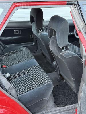 Red Toyota Corolla 1991 in Riga, with an engine capacity of 1.60 L and mileage of 180 thousand km for 9990 €, photo 15 on AUTOMOTO.COM.LV