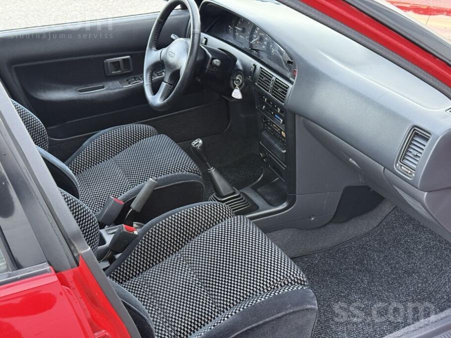 Red Toyota Corolla 1991 in Riga, with an engine capacity of 1.60 L and mileage of 180 thousand km for 9990 €, photo 17 on AUTOMOTO.COM.LV