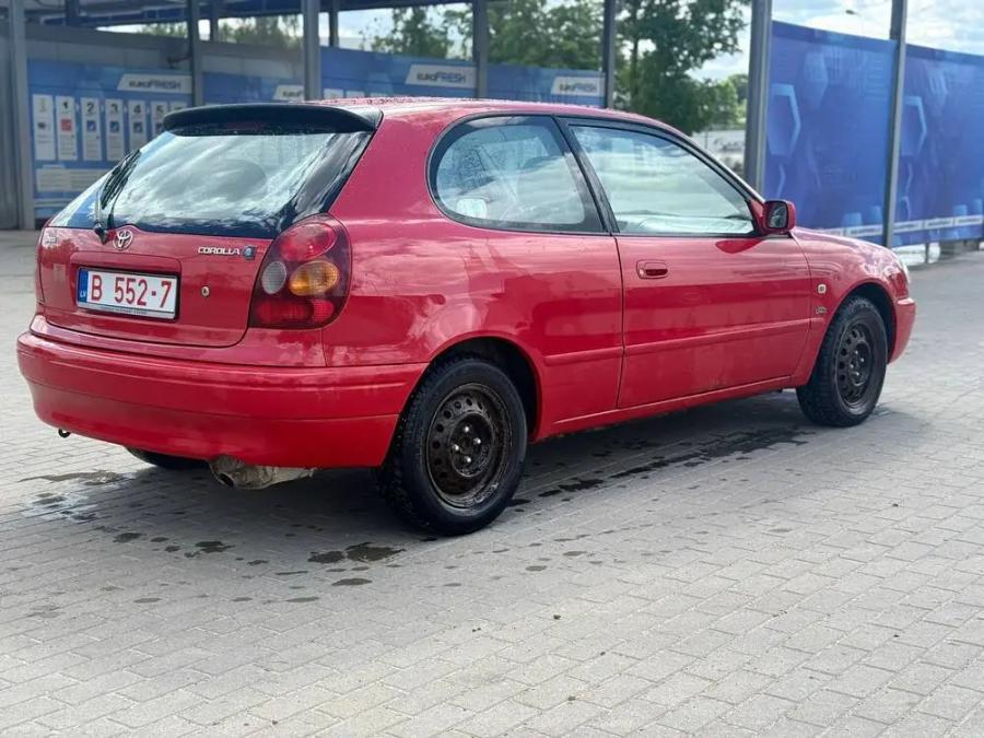 Sarkans Toyota Corolla 2001 Rēzekne, ar dzinēja tilpumu 2.00 L un nobraukumu 350 tūkst. km par 590 €, foto 8 vietnē AUTOMOTO.COM.LV