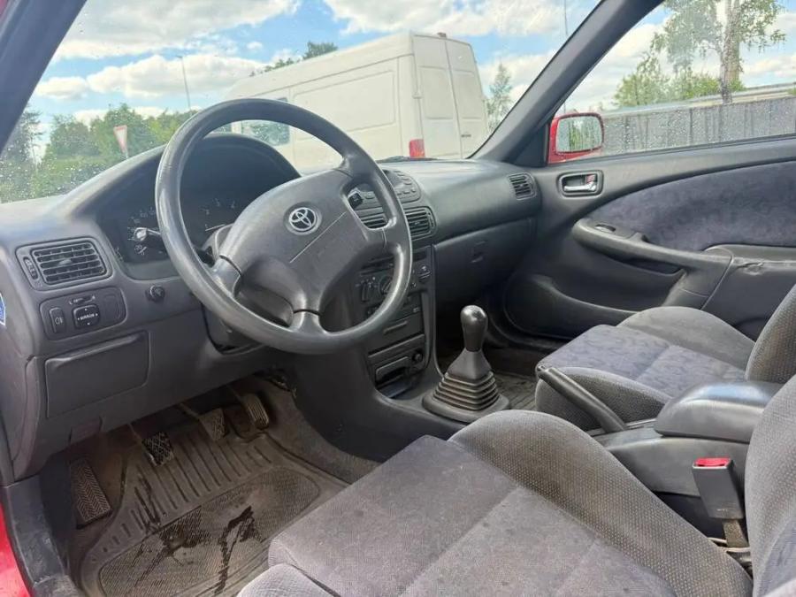 Sarkans Toyota Corolla 2001 Rēzekne, ar dzinēja tilpumu 2.00 L un nobraukumu 350 tūkst. km par 590 €, foto 9 vietnē AUTOMOTO.COM.LV