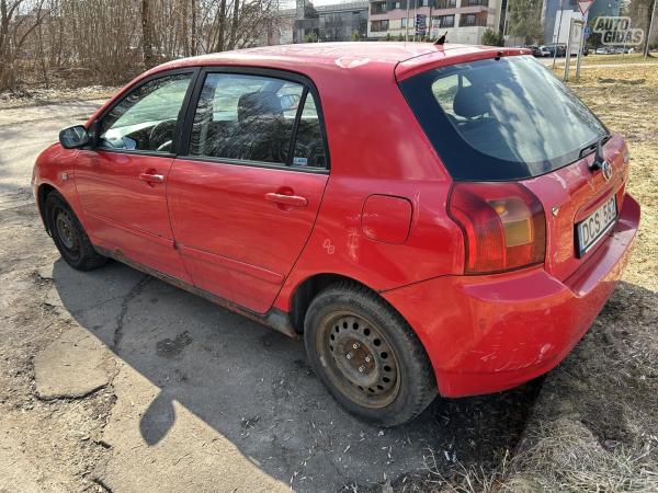 Sarkans Toyota Corolla 2003 Viļņa, ar dzinēja tilpumu 1.40 L un nobraukumu 220 tūkst. km par 499 €, foto 4 vietnē AUTOMOTO.COM.LV