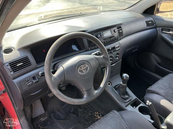 Sarkans Toyota Corolla 2003 Viļņa, ar dzinēja tilpumu 1.40 L un nobraukumu 220 tūkst. km par 499 €, foto 8 vietnē AUTOMOTO.COM.LV