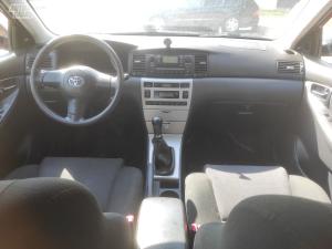 Sarkans Toyota Corolla 2006 Kauņa, ar dzinēja tilpumu 1.40 L un nobraukumu 184 tūkst. km par 2250 €, foto 10 vietnē AUTOMOTO.COM.LV